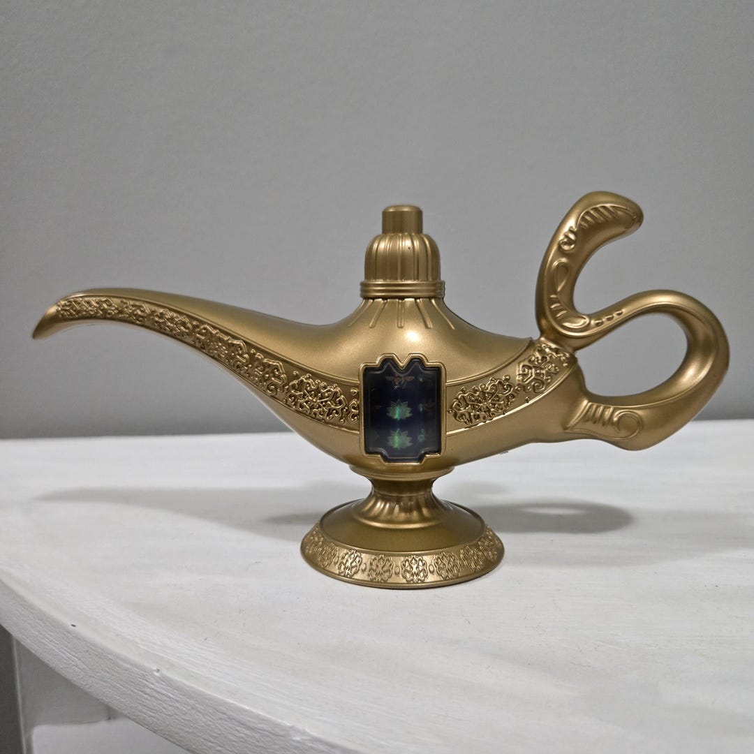 Disney Store Aladdin Lamp Spin Light up Sounds Magic Fortune Genie Lamp ...