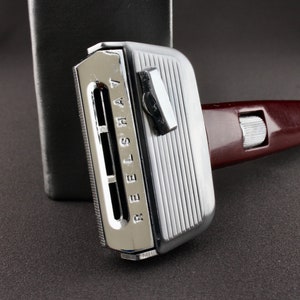 Vintage 1960s Warner-hudnut Reelshav Silver and Dark Red Lucite Single ...