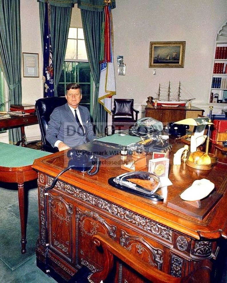 President John F. Kennedy Sits at the resolute Desk in the Oval Office ...