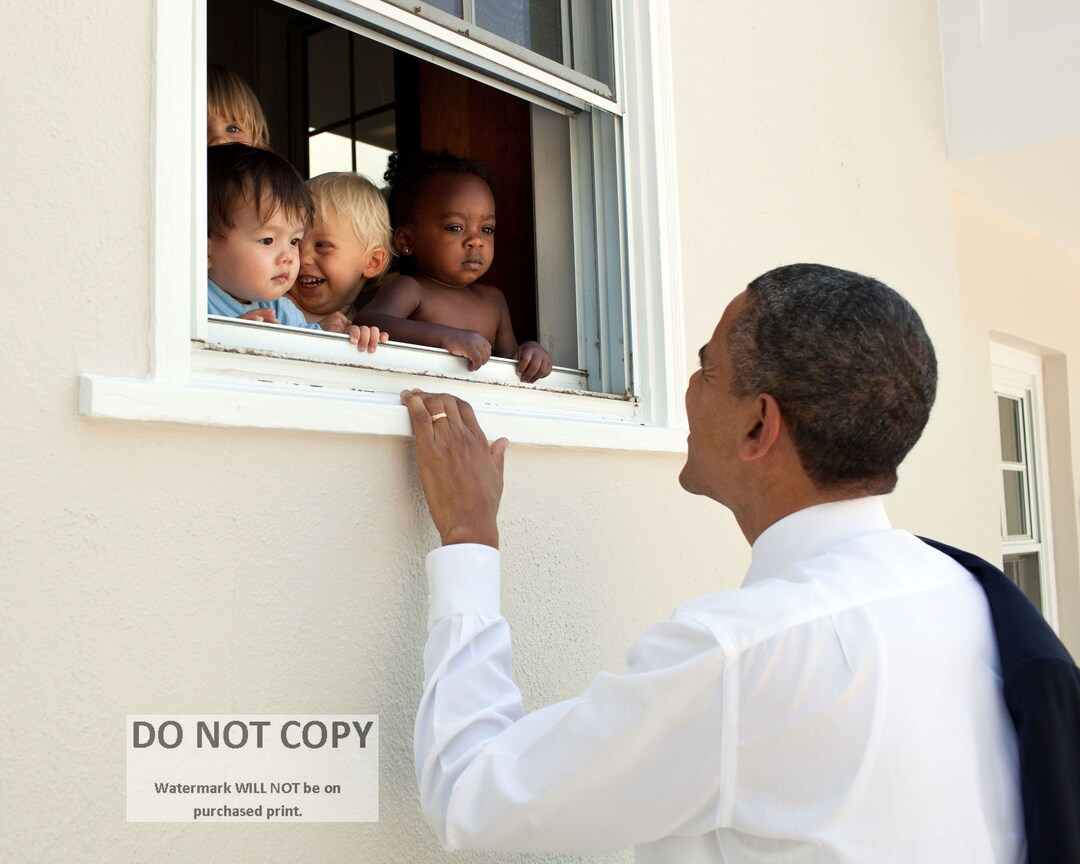 President Barack Obama Greets Children at a Daycare Center Next to ...