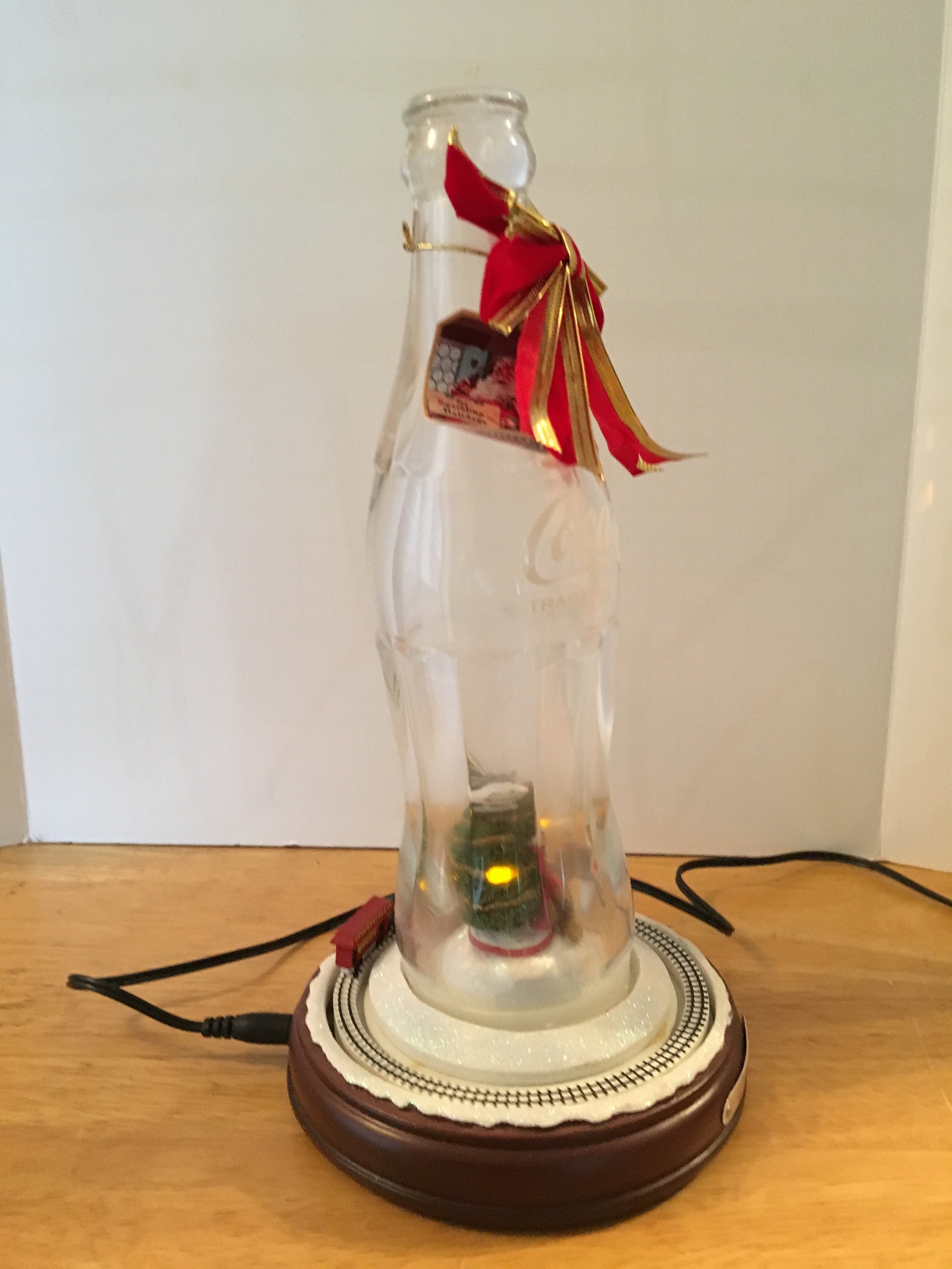 Coca-Cola table top Santa and train set with santa in the bottle