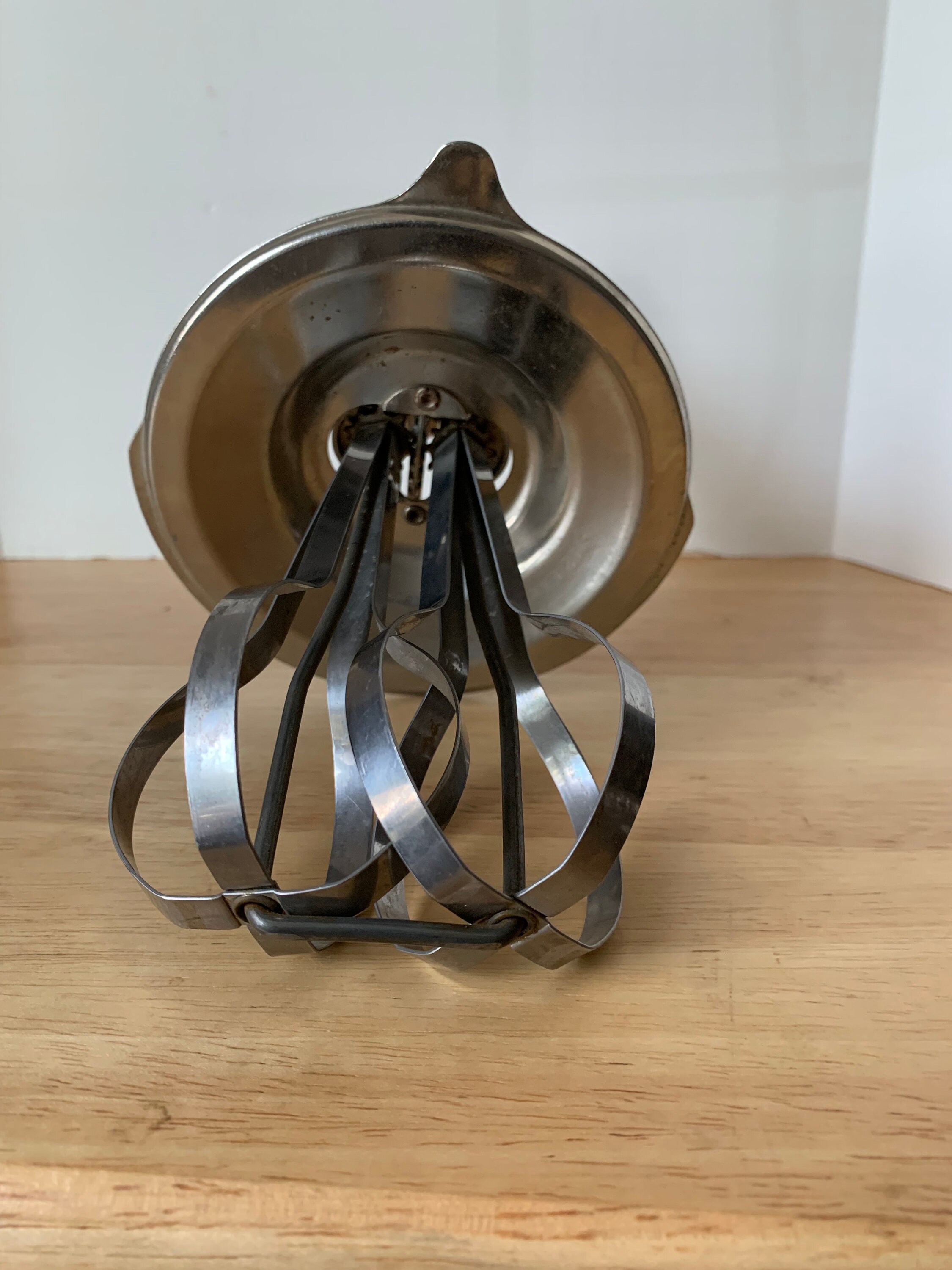 Vintage Androck hand mixer or egg beater with top