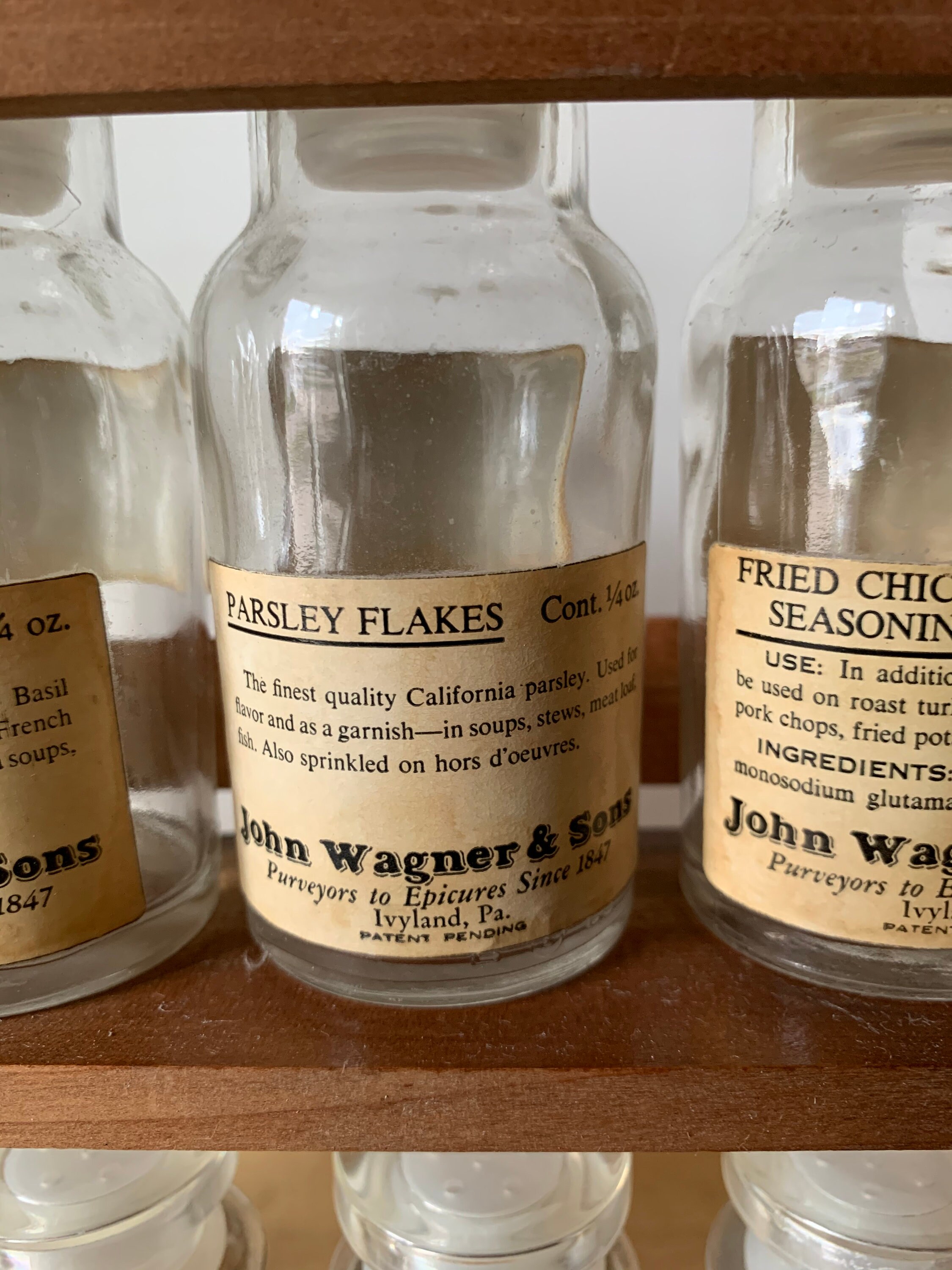 Vintage 12 jar counter top or wall hanging John Wagner and Sons spice rack