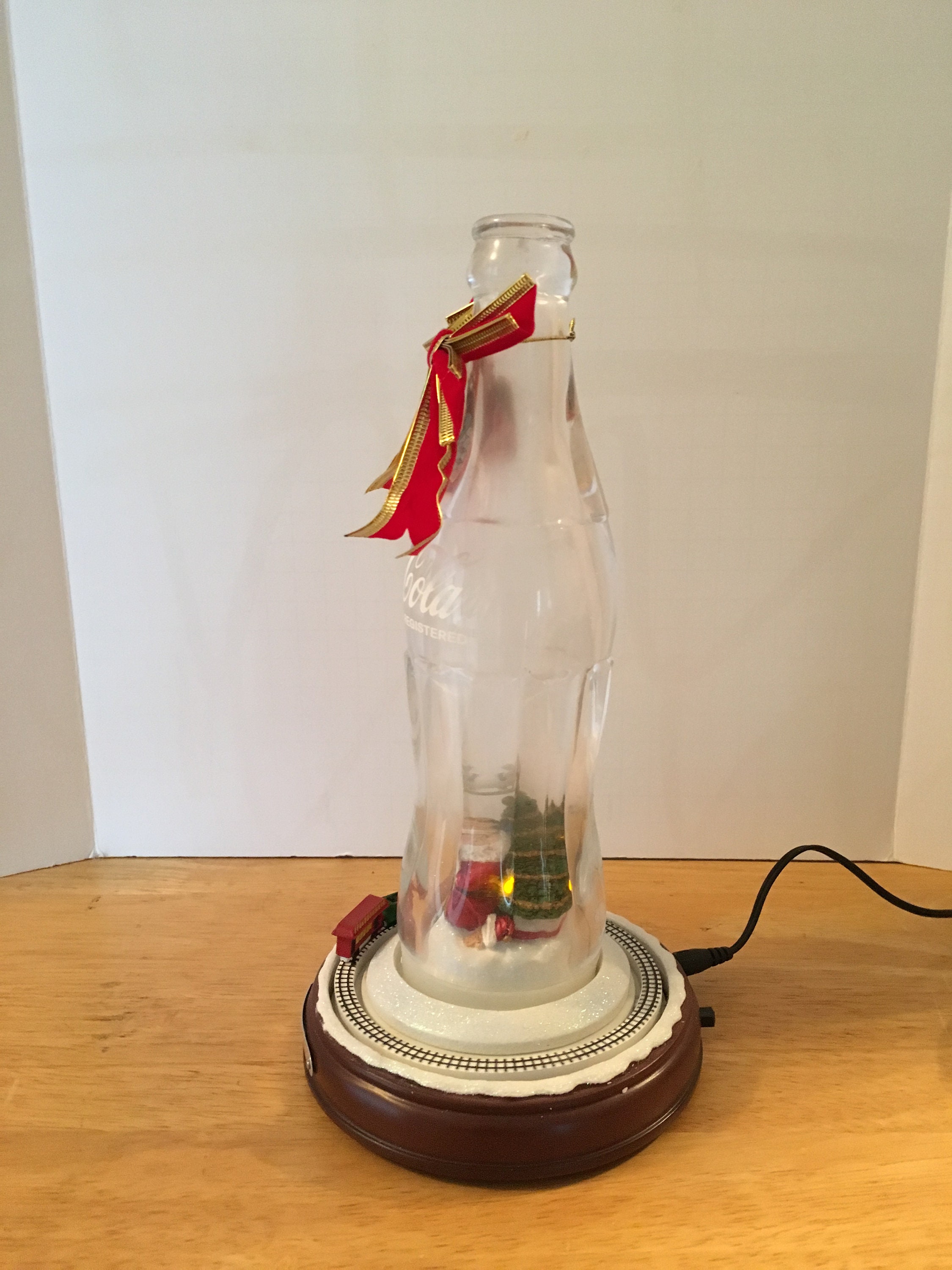 Coca-Cola table top Santa and train set with santa in the bottle