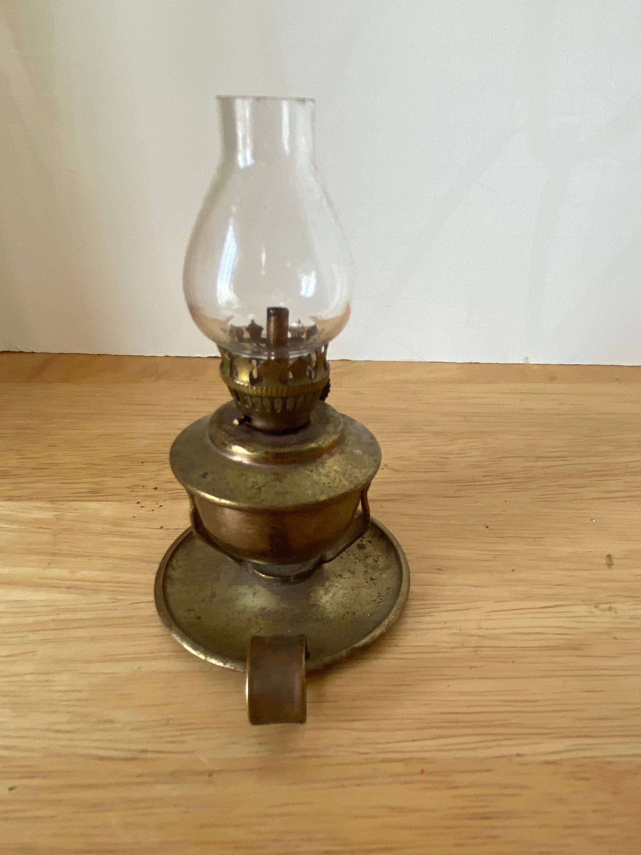 Miniature brass swivel finger oil lamp with clear chimney and wick