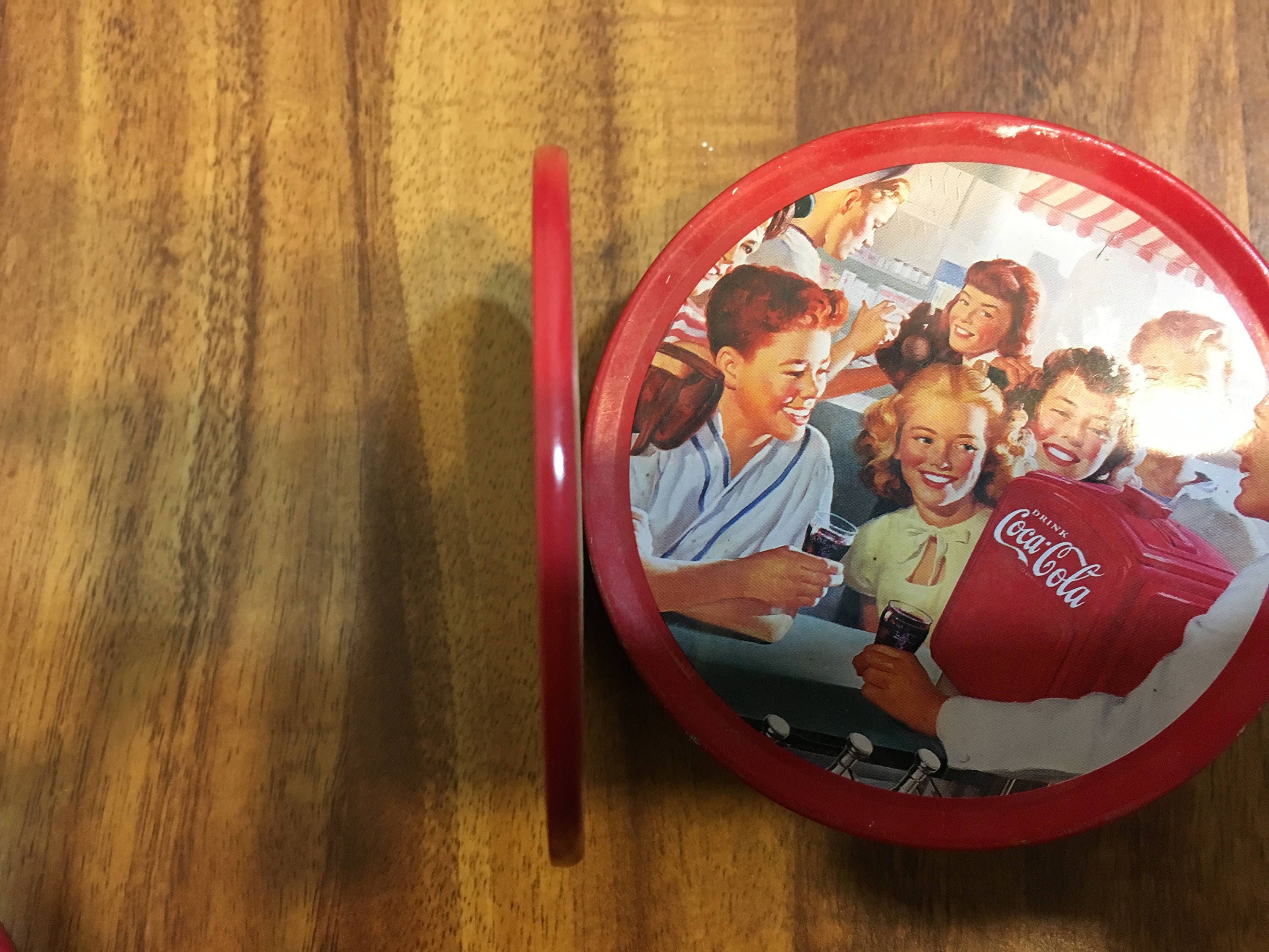 vintage 6 plastic Coca-Cola coasters with tin