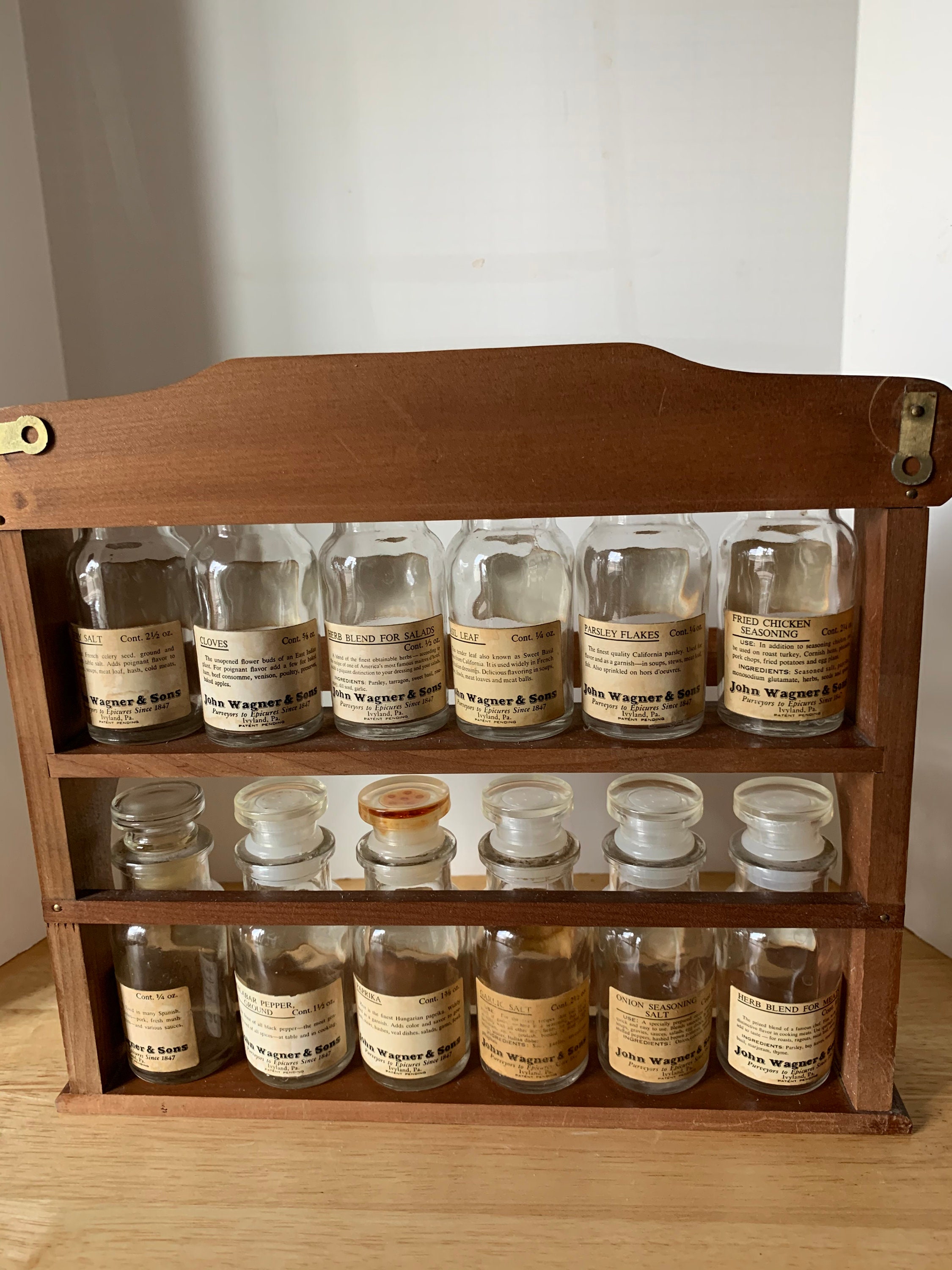 Vintage 12 jar counter top or wall hanging John Wagner and Sons spice rack