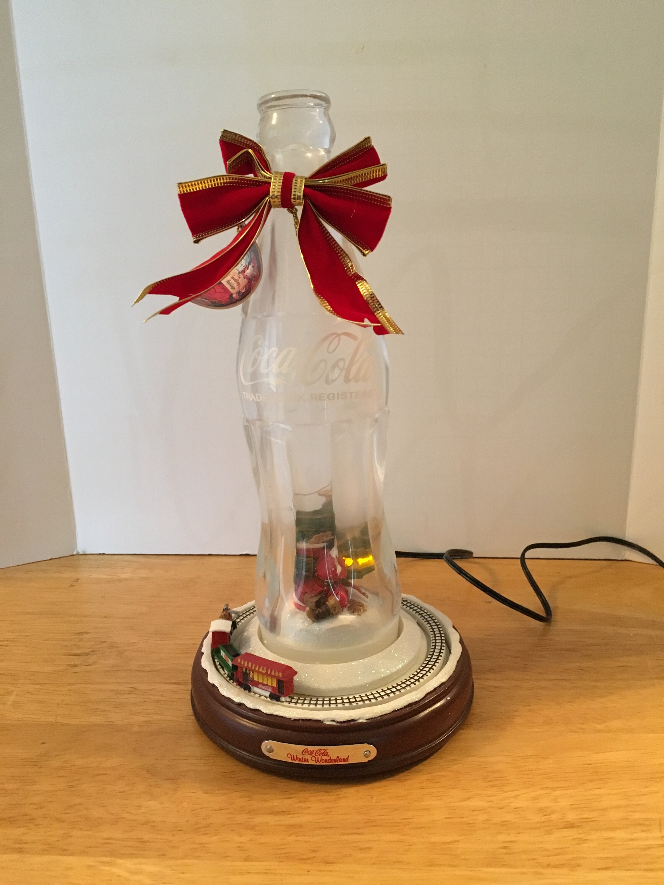 Coca-Cola table top Santa and train set with santa in the bottle