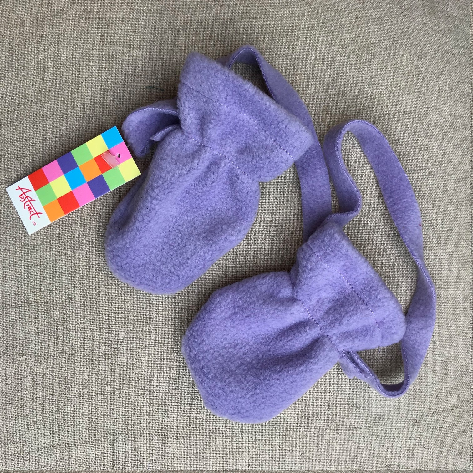 Thumbless fleece baby mittens on a string assorted colours & sizes ...