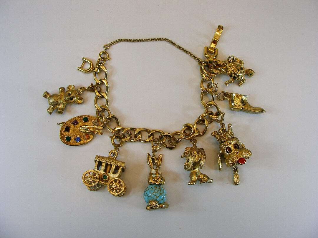 Signed Rare MONET Gold Plated Charm Bracelet, 8 Piece Monet Book Spring ...