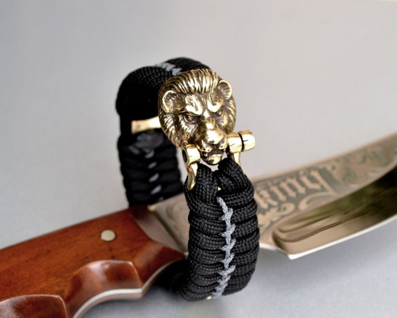 Mens bracelet with brass lion head shackle helmet of horror | Etsy