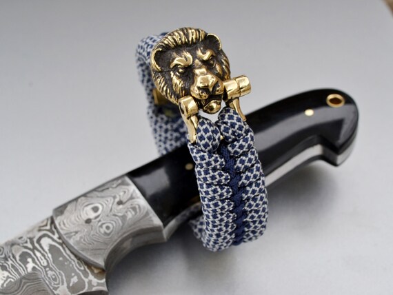 Mens bracelet with brass lion head shackle helmet of horror | Etsy