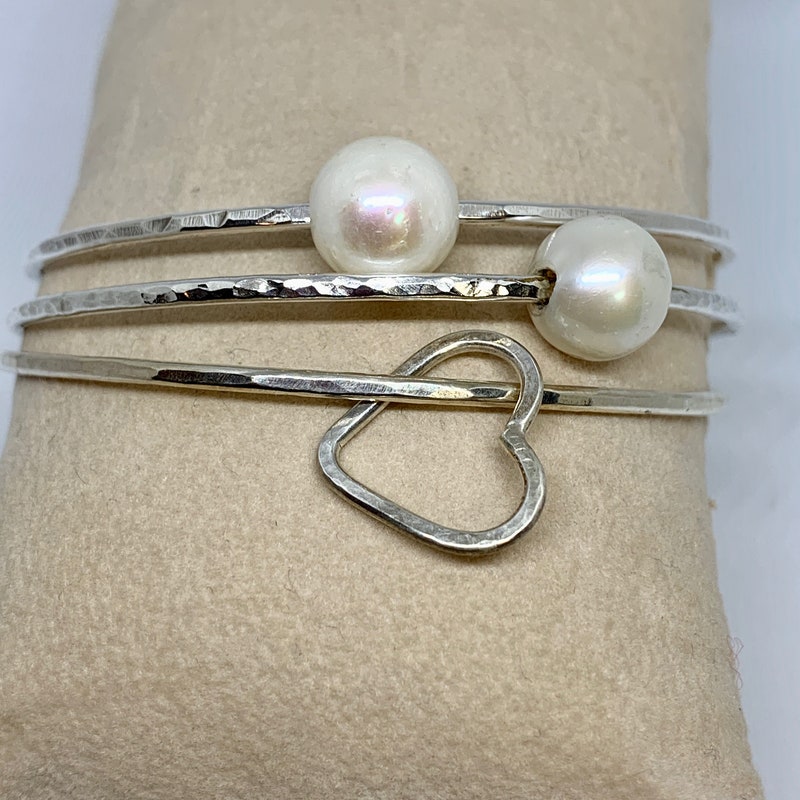 Floating Bracelet - Etsy