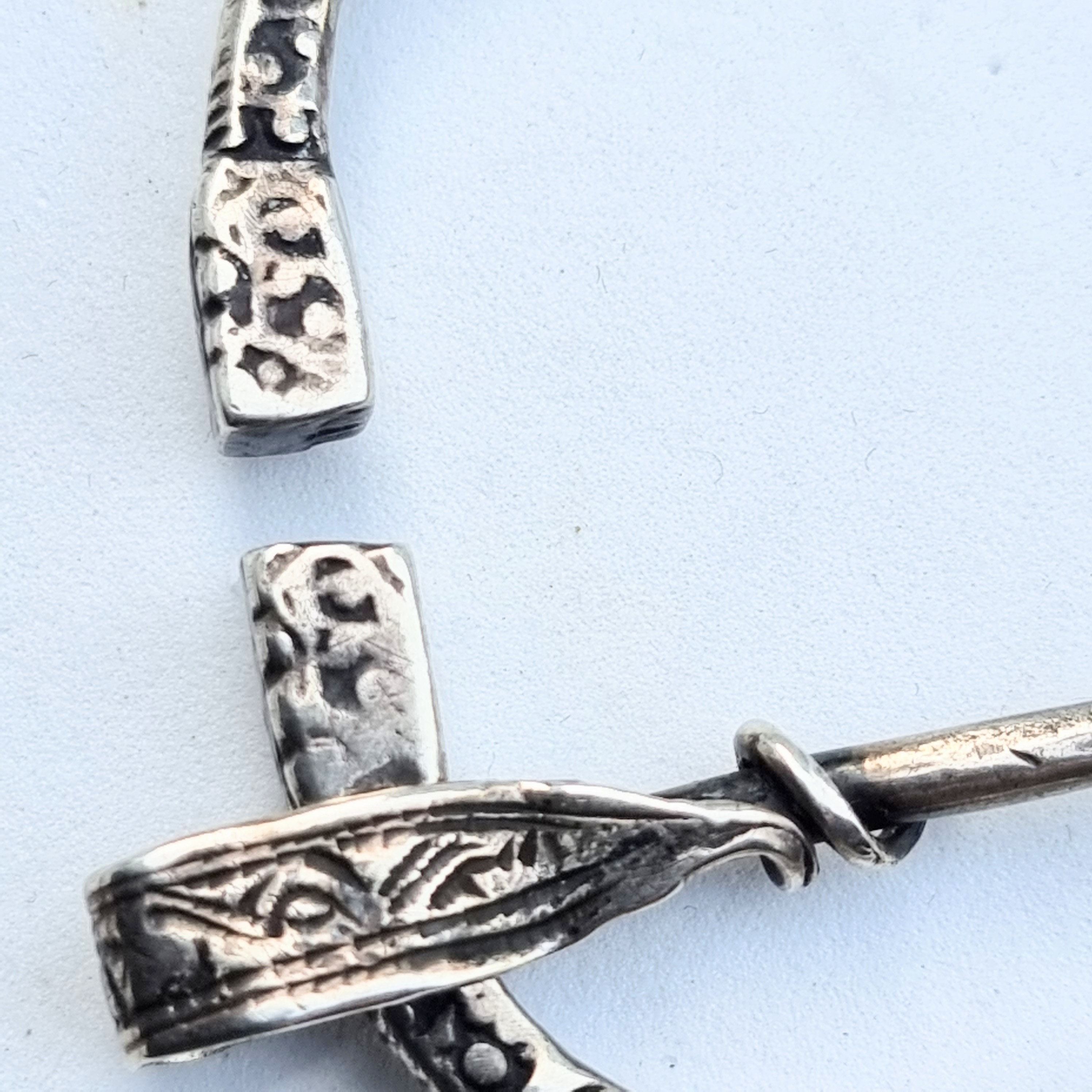 An Early Silver Zoomorphic Penannular Brooch of the Initial Form. LR ...