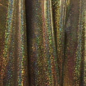 New Gold Hologram Mystique on Black 4 Way Stretch Nylon Spandex Fabric ...