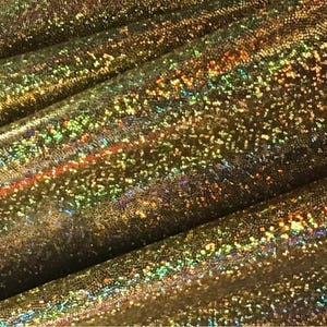 New Gold Hologram Mystique on Black 4 Way Stretch Nylon Spandex Fabric ...