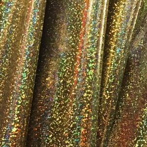 New Gold Hologram Mystique on Black 4 Way Stretch Nylon Spandex Fabric ...