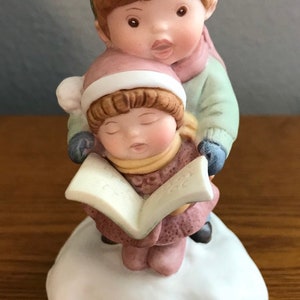 1985 Avon "joy to the World" Hand Painted Porcelain Musical Figurine in ...