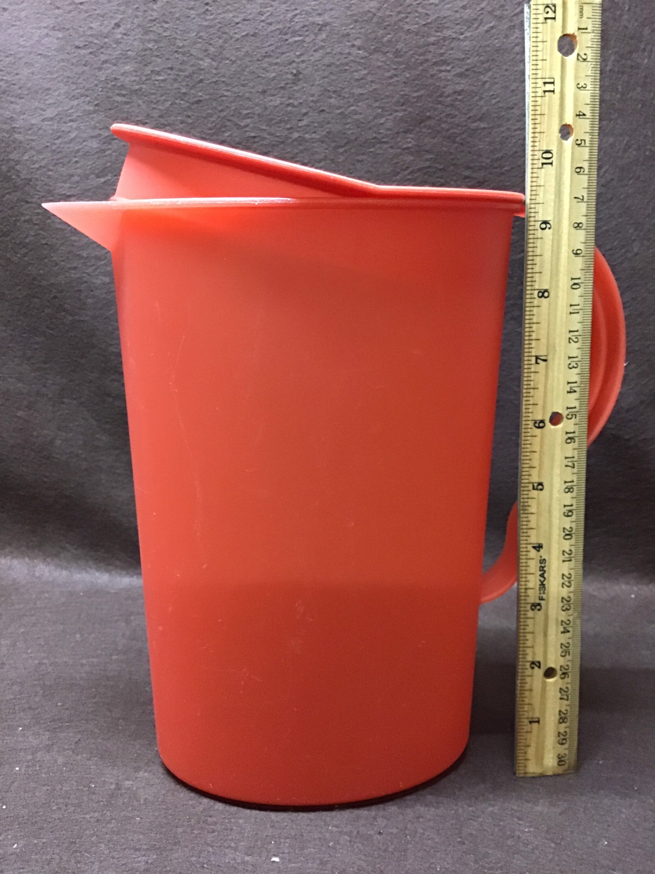 Vintage used orange Tupperware pitcher. Rocker lid. | Etsy