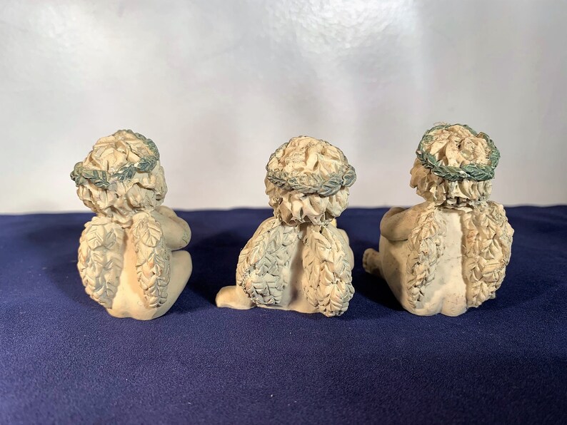 Three Small Bisque Colored Resin Angel Figurines Wearing Wreaths on ...