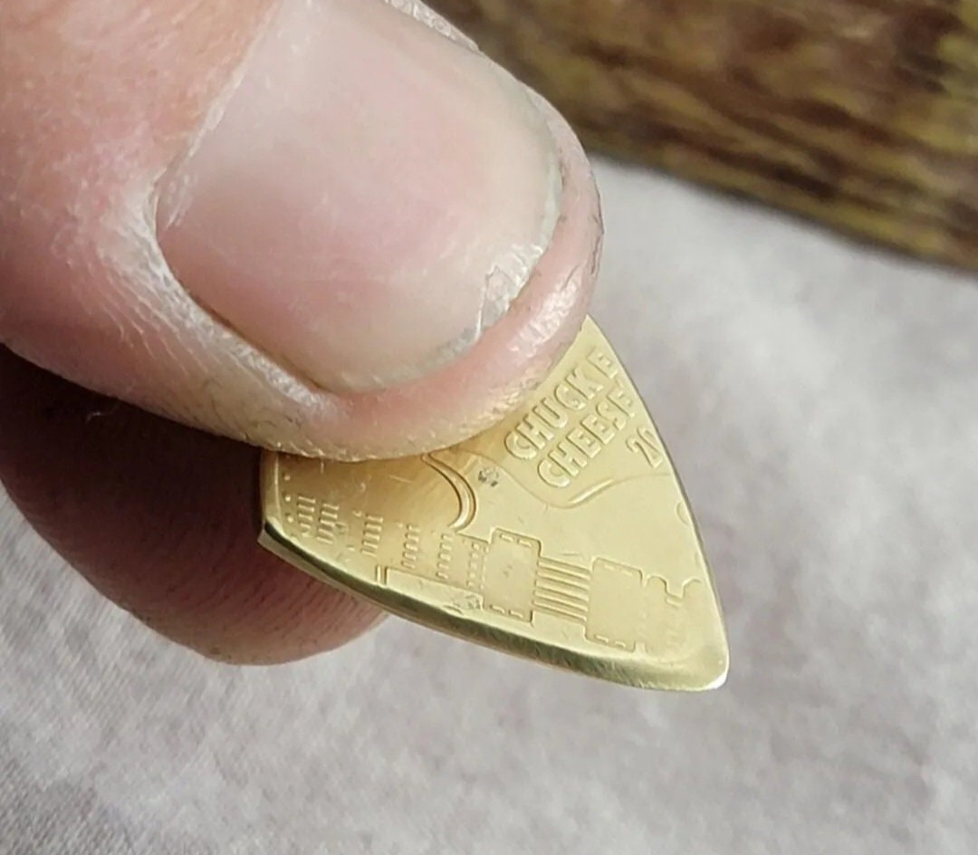 Coin Guitar Pick. CHUCK E CHEESE Token. Solid Brass. Handmade. Chucky ...