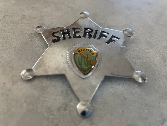 Six Point Badge