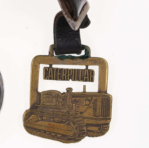 WW2 Era Caterpillar Watch Fob - Gem
