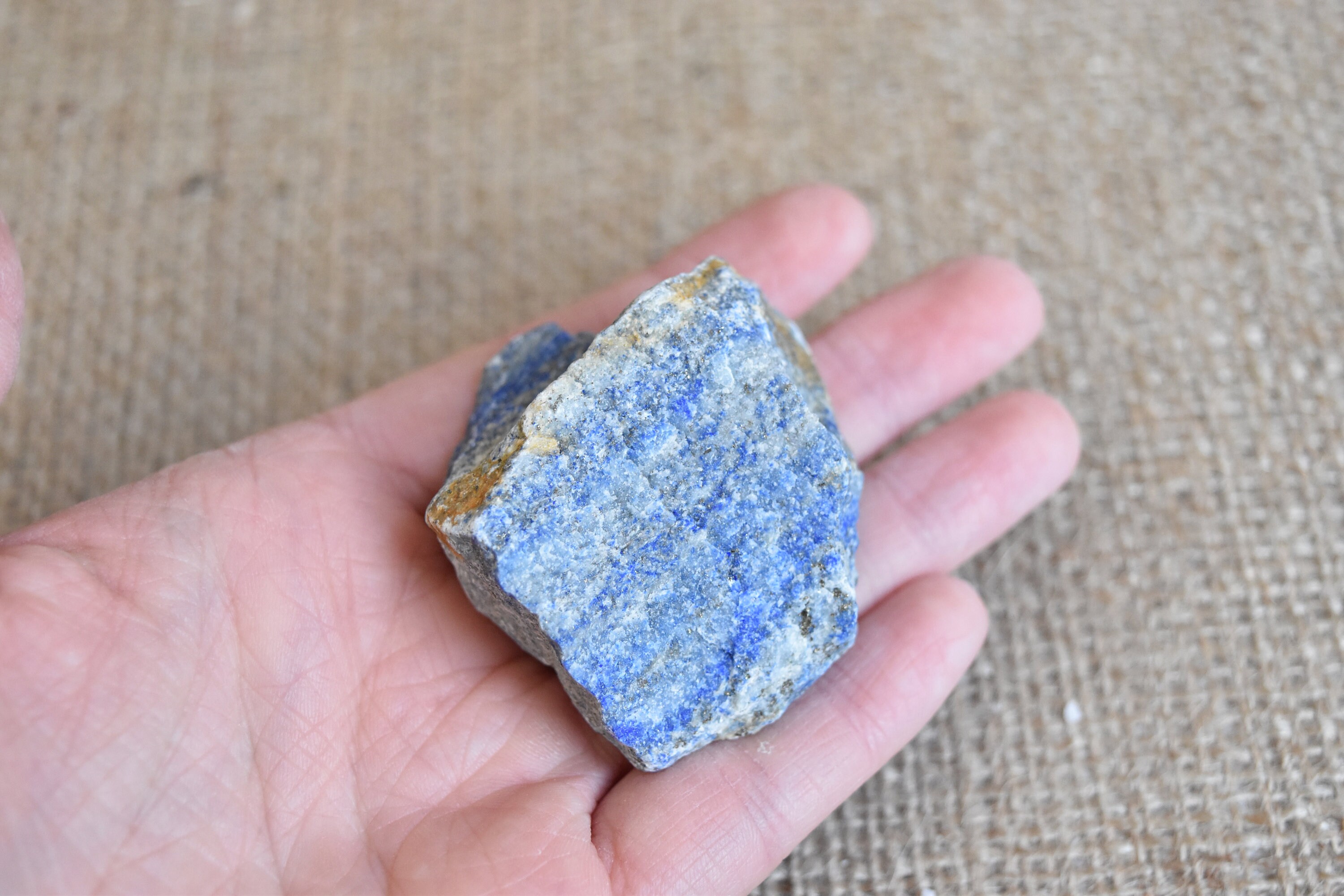 Fluorescent marialite (scapolite), calcite, pyrite, and lapis lazuli ...