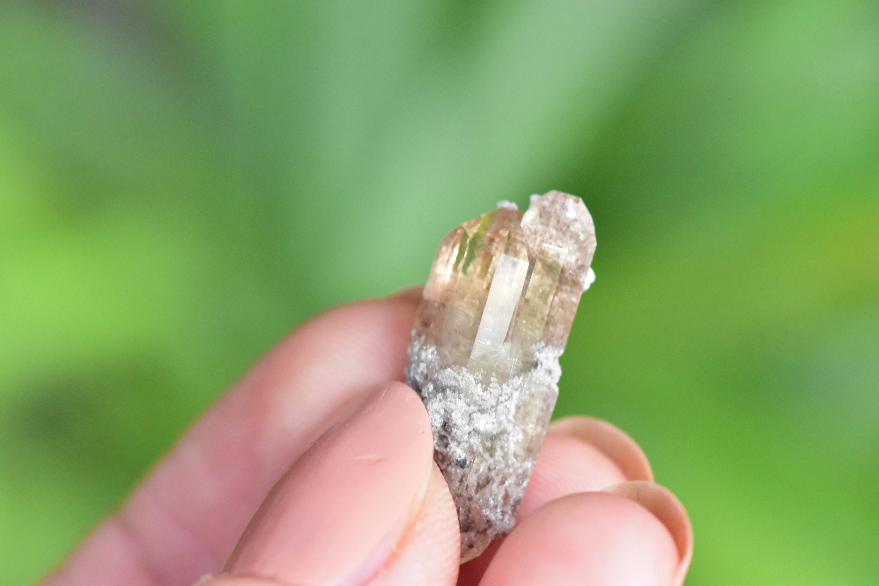 Imperial Topaz, Bixbyite, and Rhyolite crystal cluster from Utah.