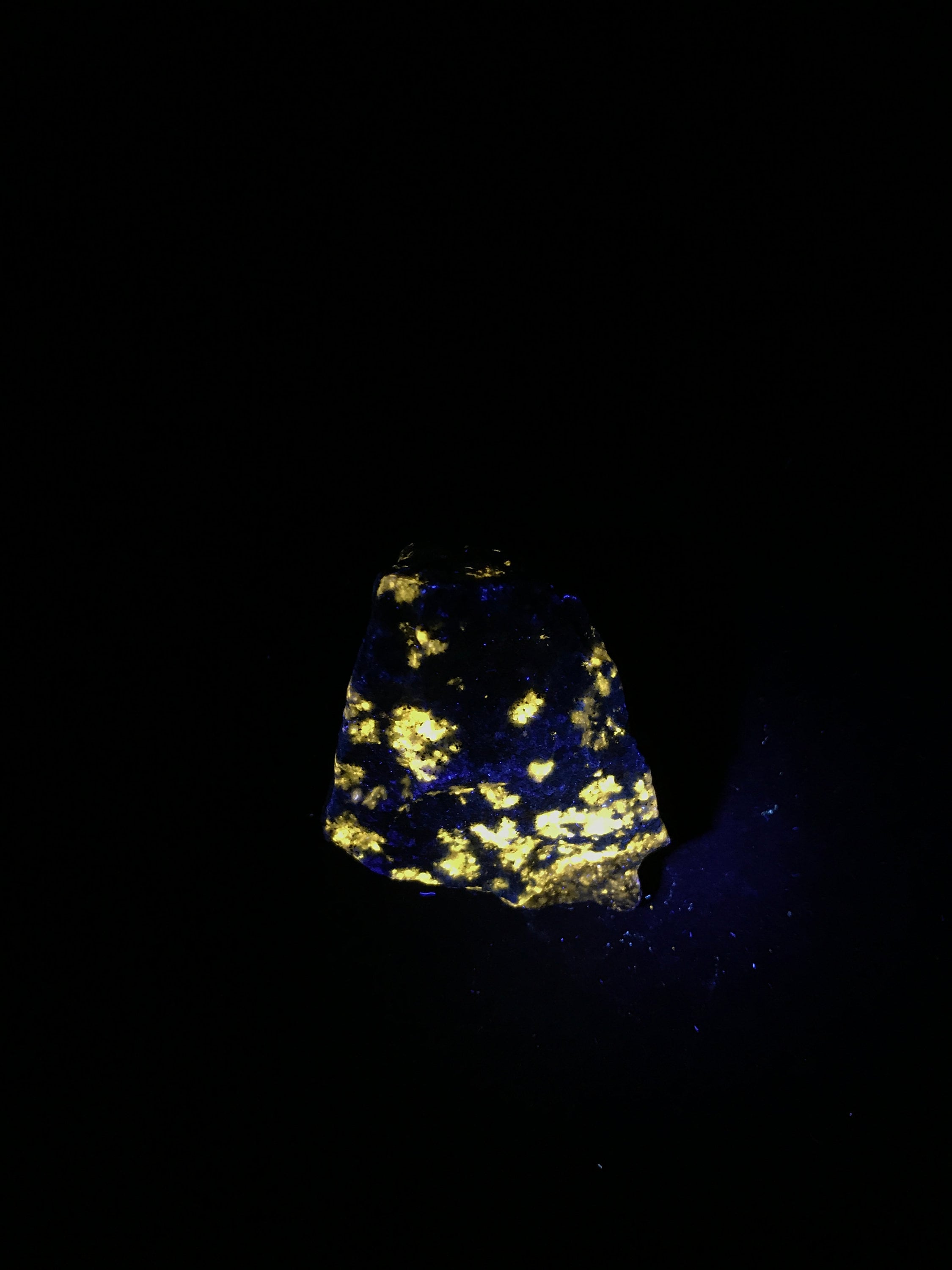 Fluorescent marialite (scapolite), calcite, pyrite, and lapis lazuli ...