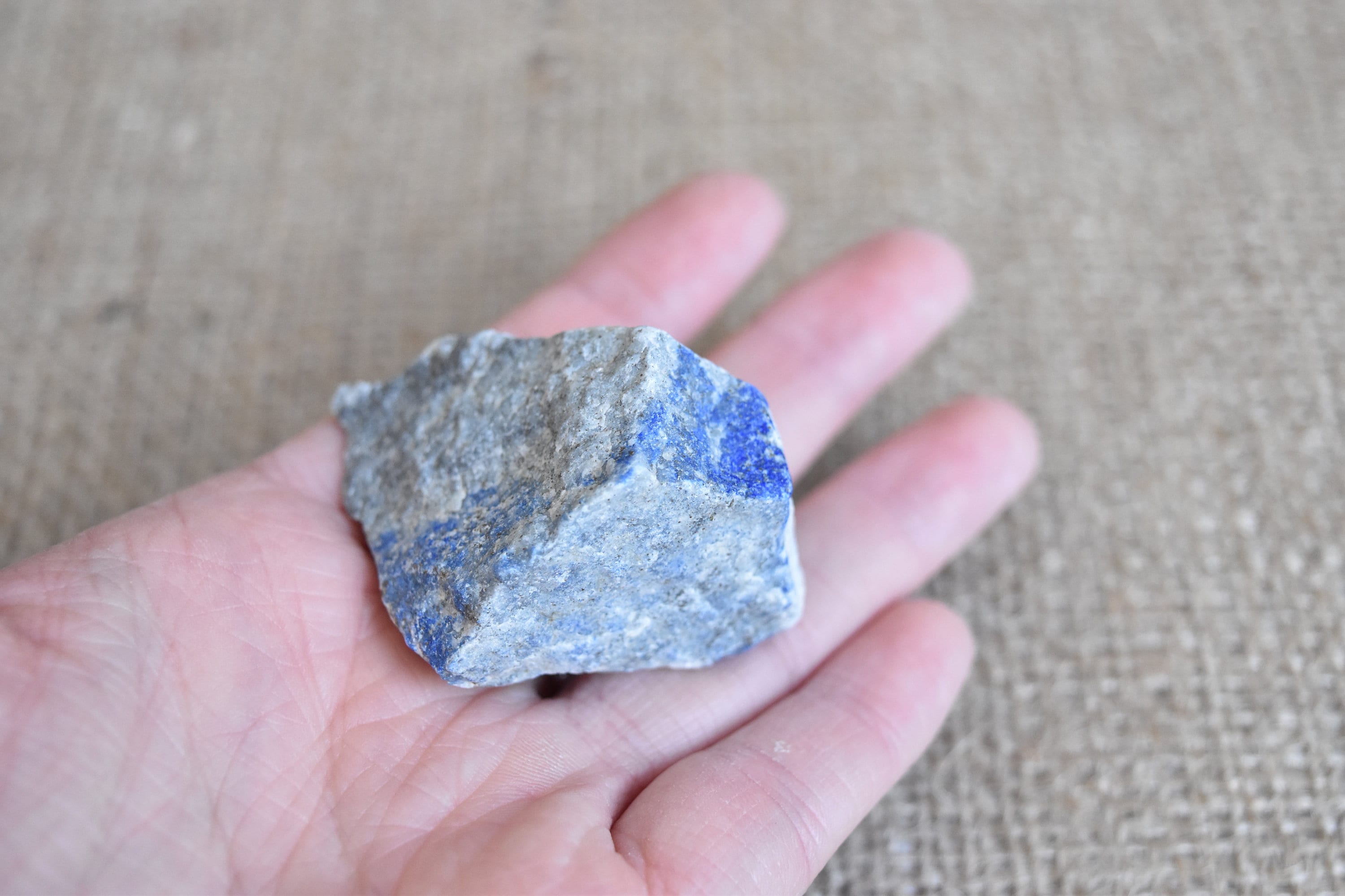 Fluorescent marialite (scapolite), calcite, pyrite, and lapis lazuli ...