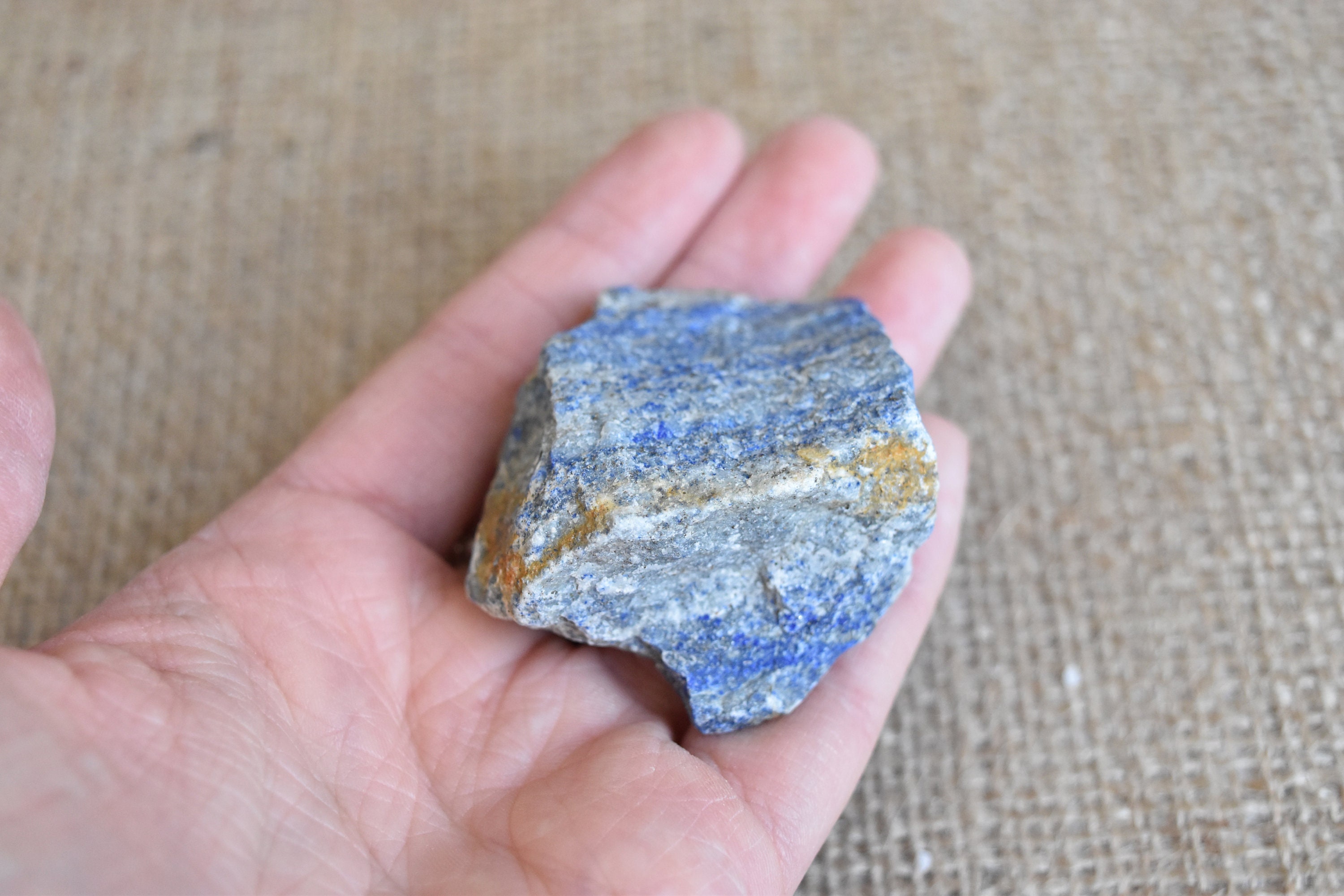 Fluorescent marialite (scapolite), calcite, pyrite, and lapis lazuli ...