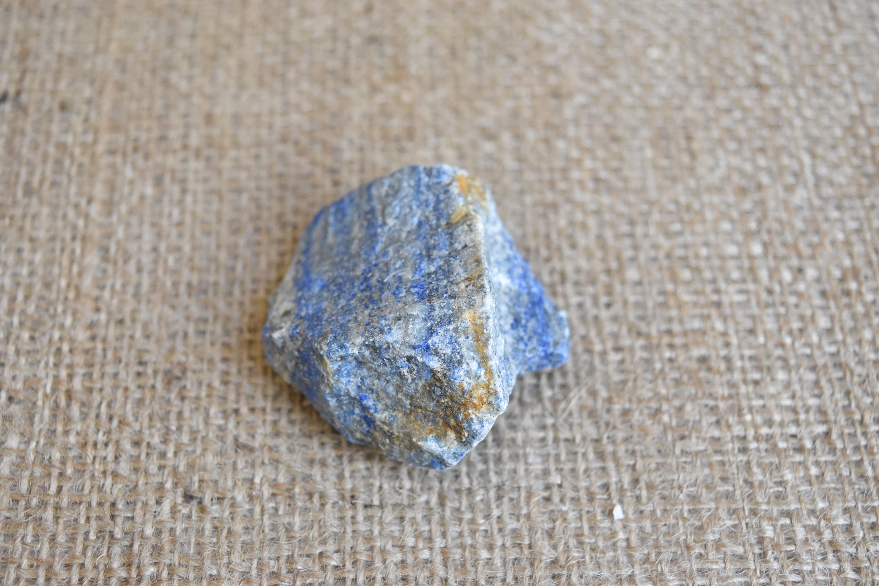Fluorescent marialite (scapolite), calcite, pyrite, and lapis lazuli ...