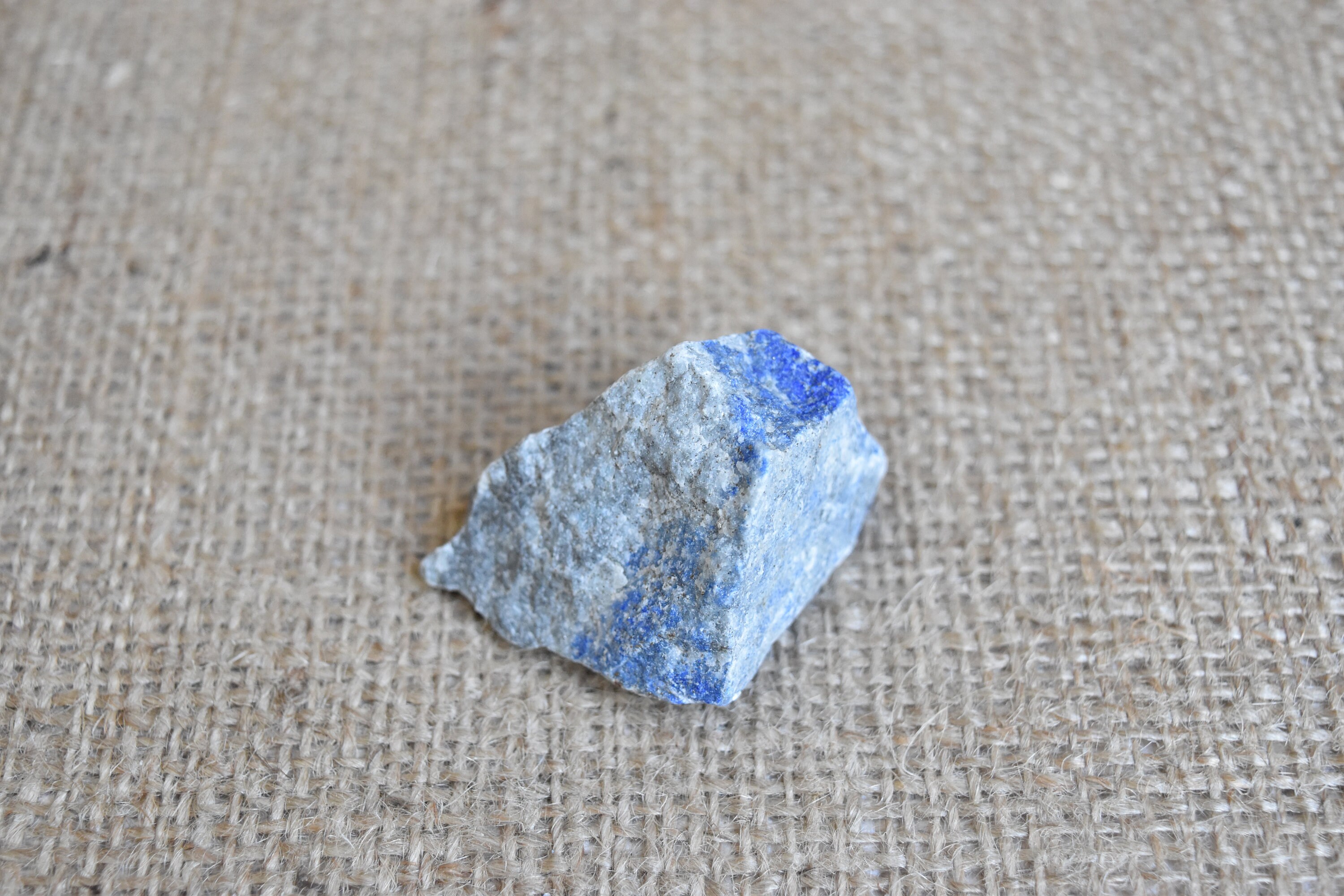 Fluorescent marialite (scapolite), calcite, pyrite, and lapis lazuli ...