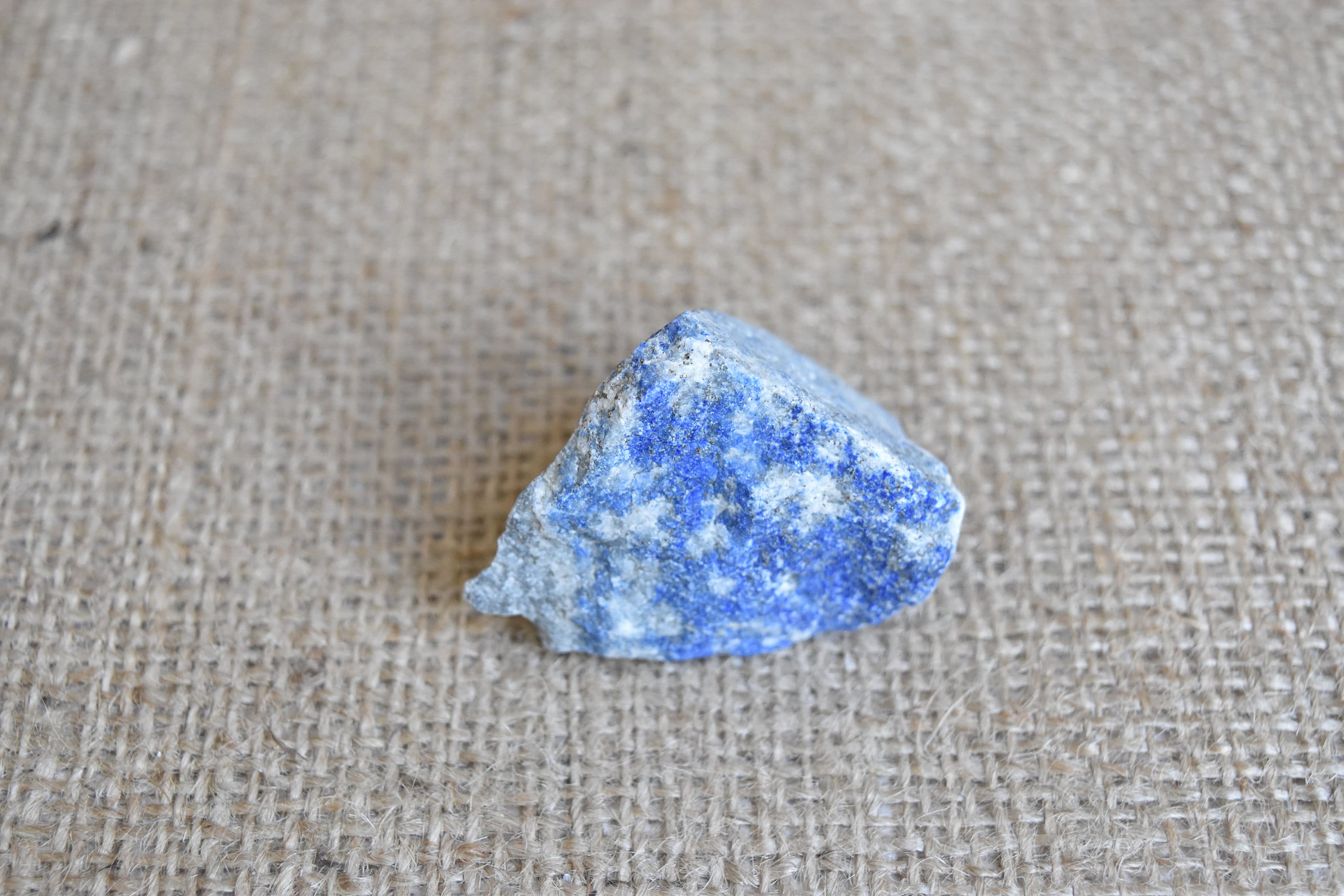 Fluorescent marialite (scapolite), calcite, pyrite, and lapis lazuli ...