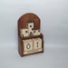 Desk Perpetual Calendar in Brown and Vanilla Colors With Small Houses ...