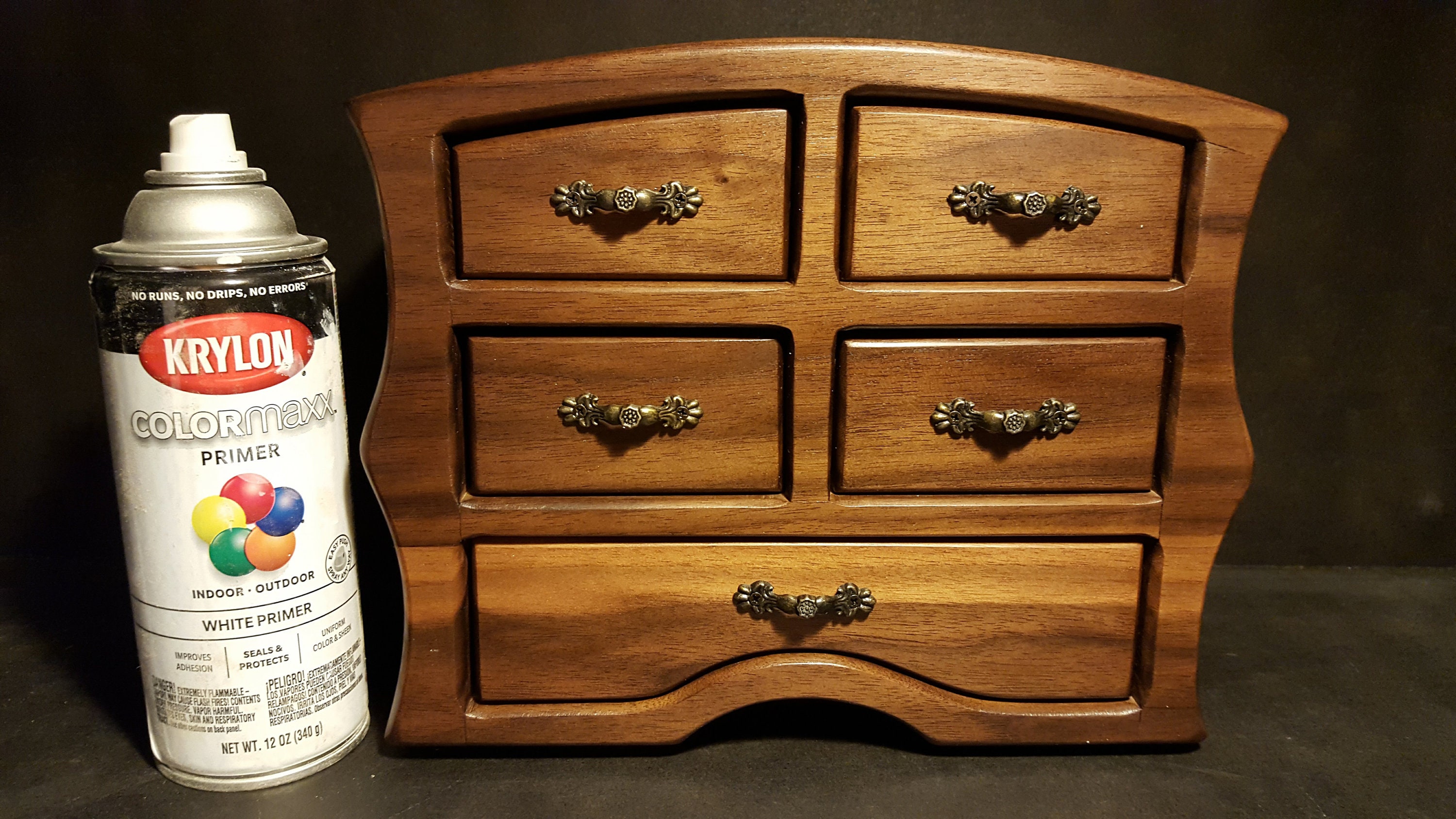 Jewelry box made from black walnut, red flame box elder, and padauk