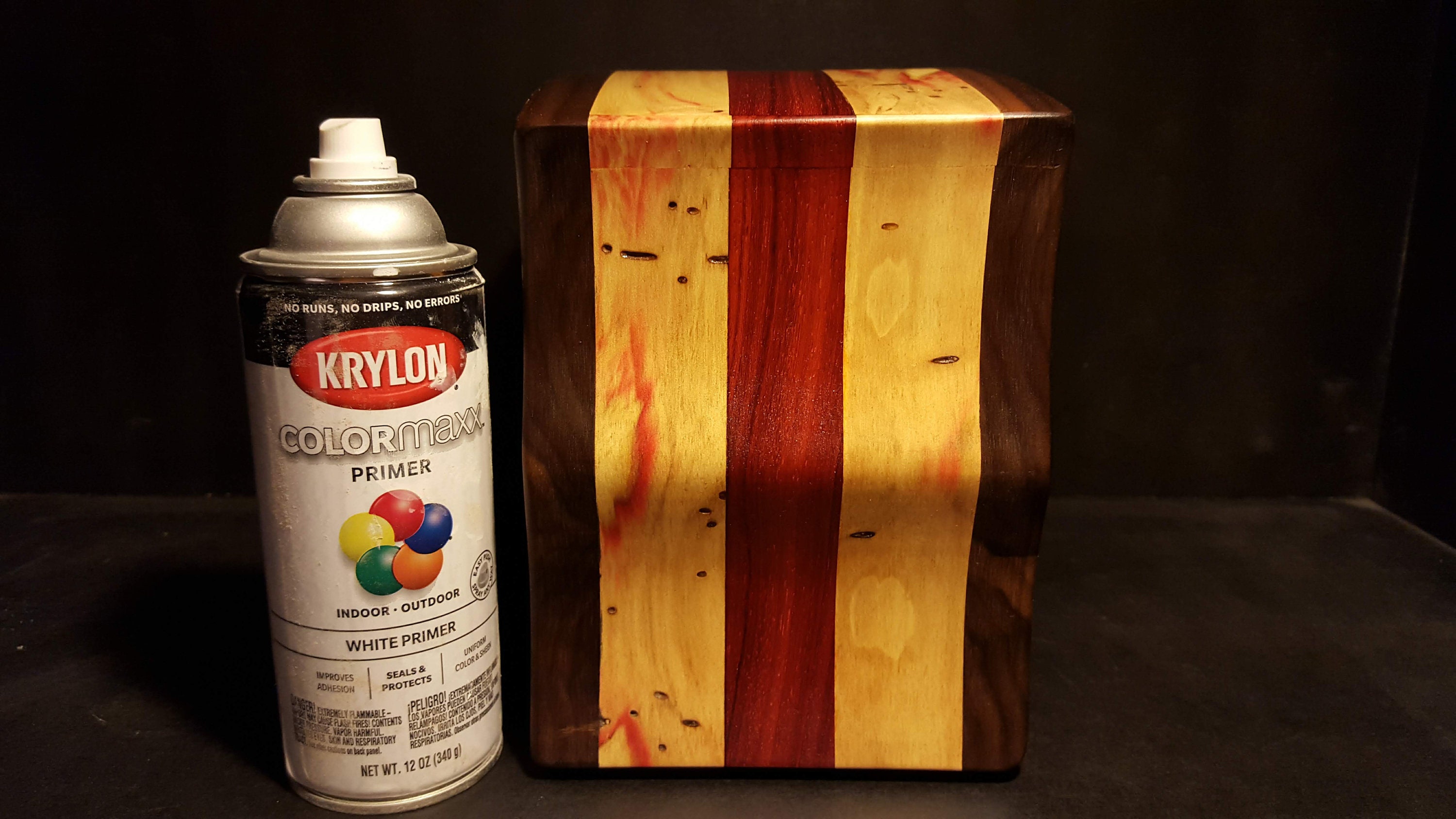 Jewelry box made from black walnut, red flame box elder, and padauk