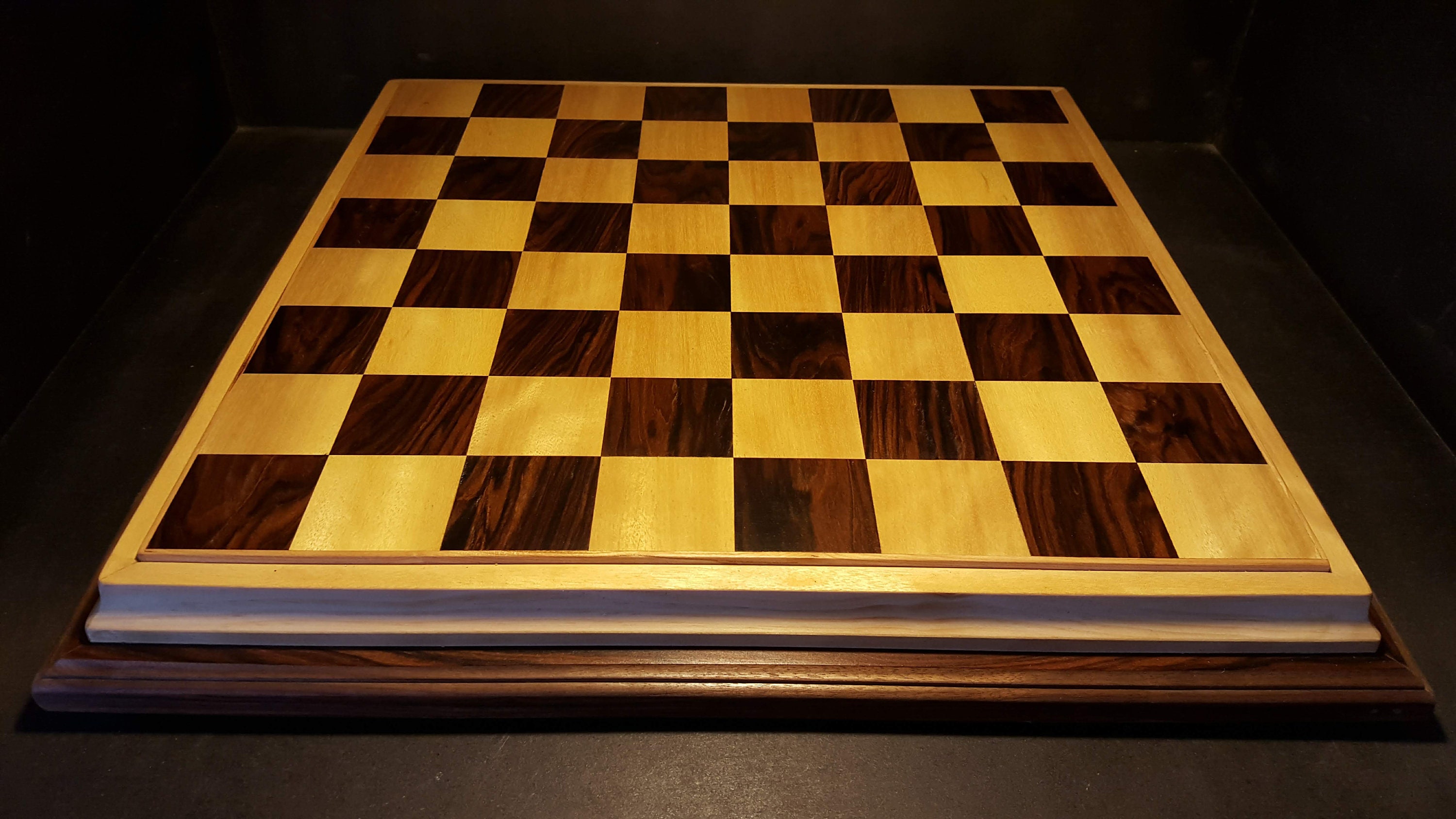 Chessboard made from figured rosewood, white mahogany, walnut, and ...