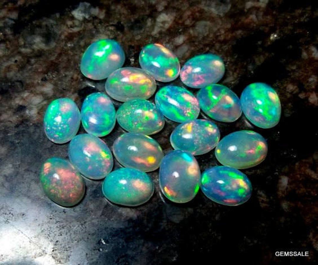 10 Ethiopian Opal Cabochons: AAA Grade, Multi-fire Oval Gemstones (7x5mm) - Etsy