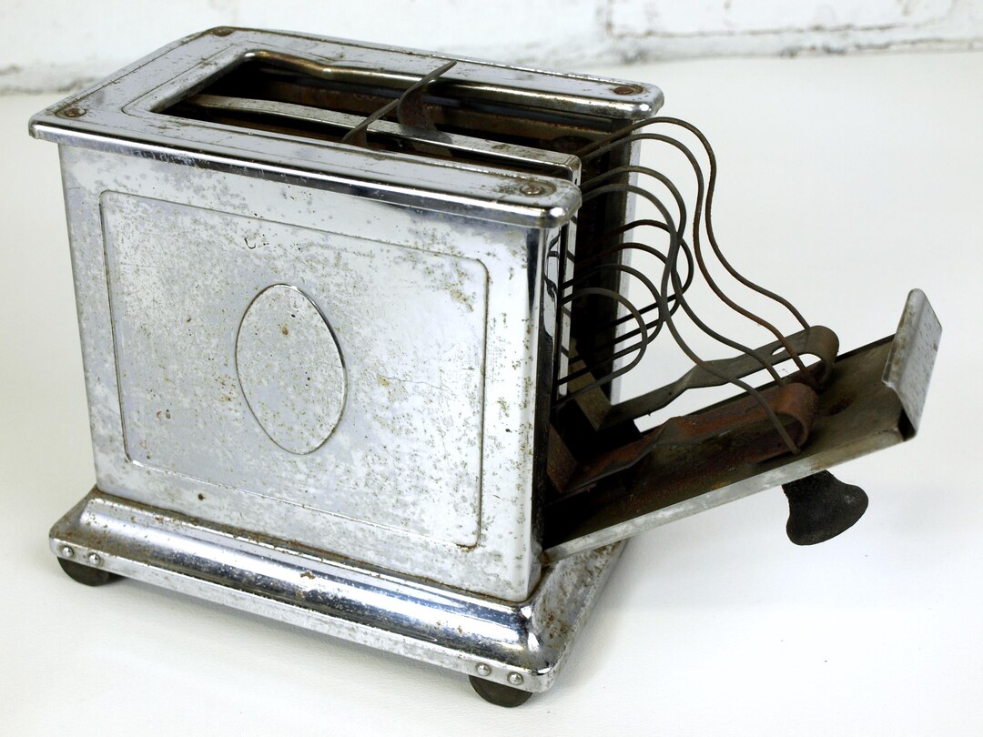 Antique Universal Two Slice Toaster Model No. E7722C - Landers, Frary ...