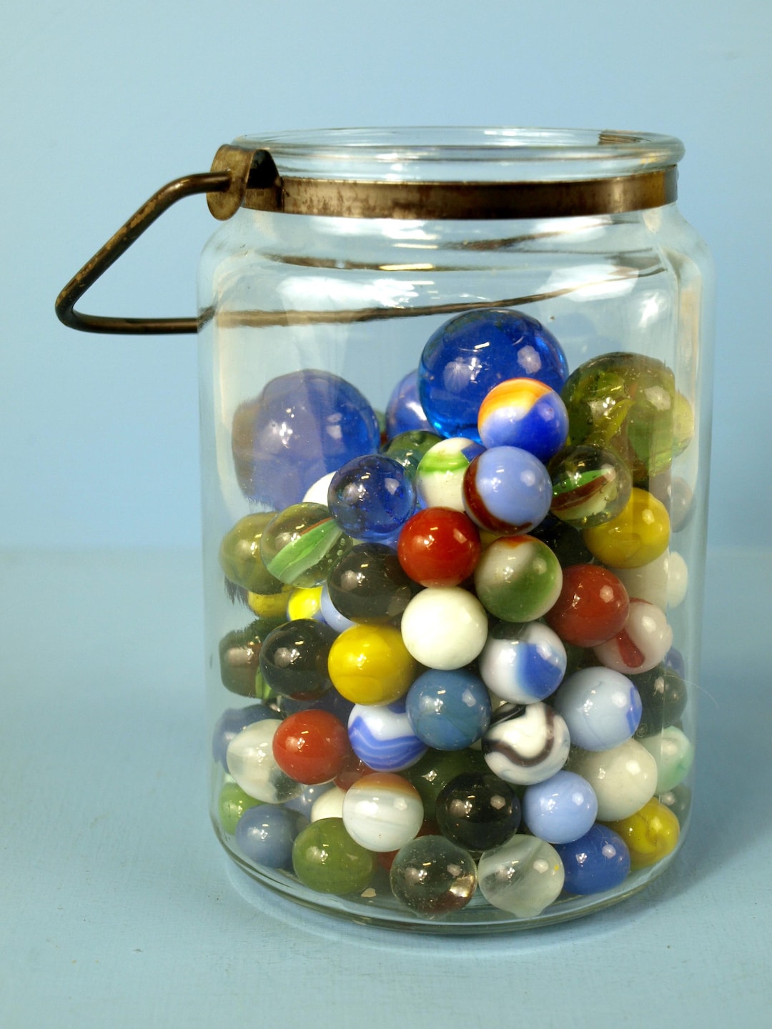 Jar of Glass Marbles Small & Large Shooters in an Old Virginia Candle ...