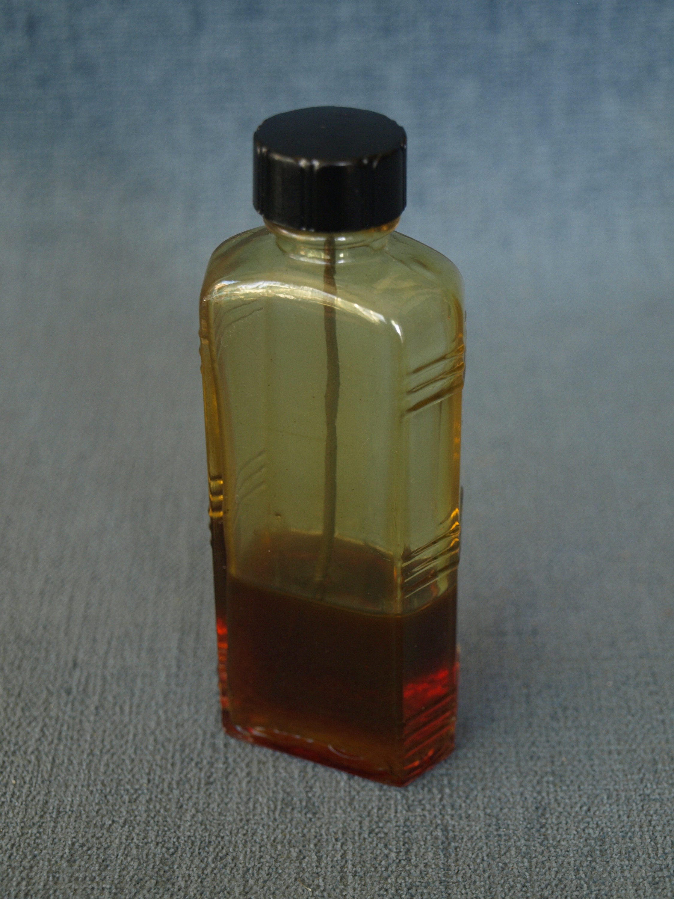 Vintage Clear Glass Bottle With Bakelite Cap With Gear Oil - 1/3 Full ...