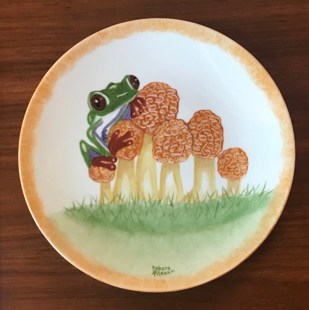 A Cute Sticky Toed Frog Clinging to a Giant Morel Mushrooms. Two Morels ...