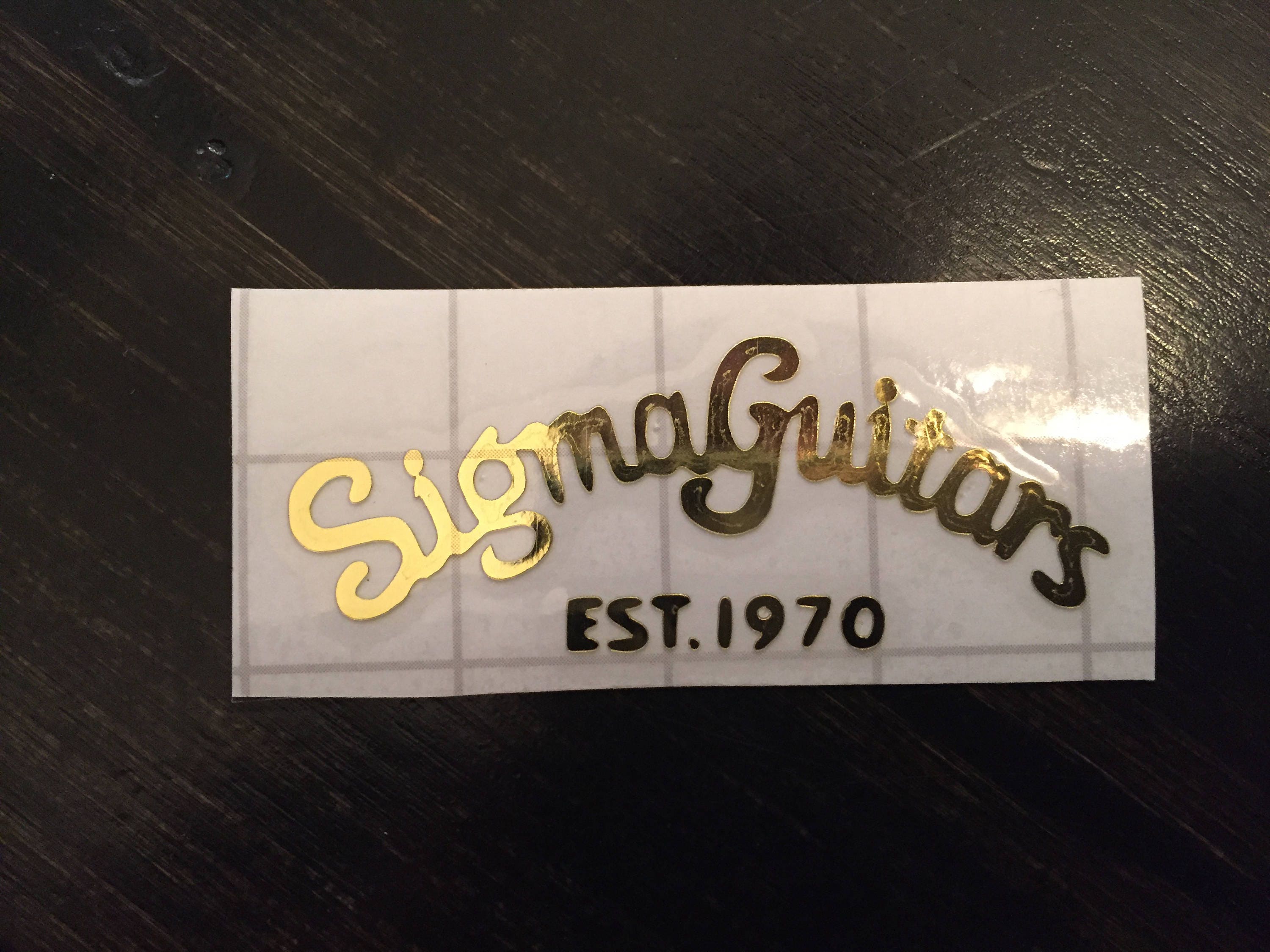Sigma Lawsuit Acoustic Guitar Headstock Decal Logo Gold Foil Etsy Sigma Lawsuit Acoustic Guitar Headstock Decal Logo Gold Foil Etsy