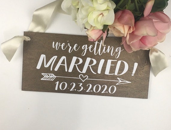 Were Getting Married Sign Asian Couple Getting Outlet Married Stock