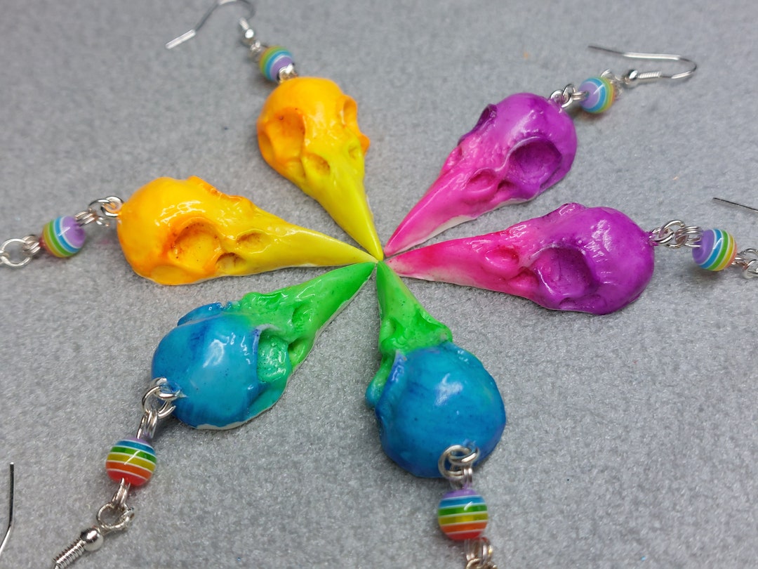 UV Ultraviolet Lumos Neon Glows on White Resin - Raven Skull Dangle ...