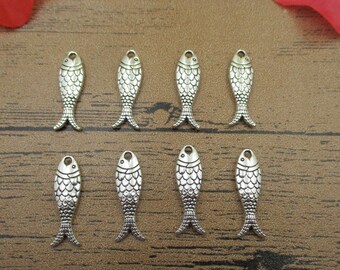 Fish charms | Etsy