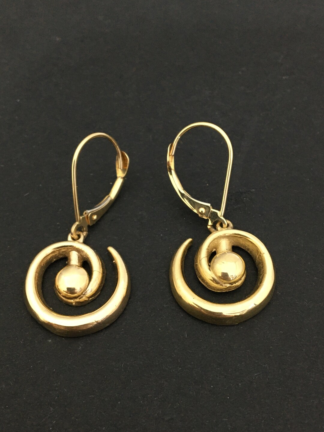 Hurricane Earrings Gold - Etsy
