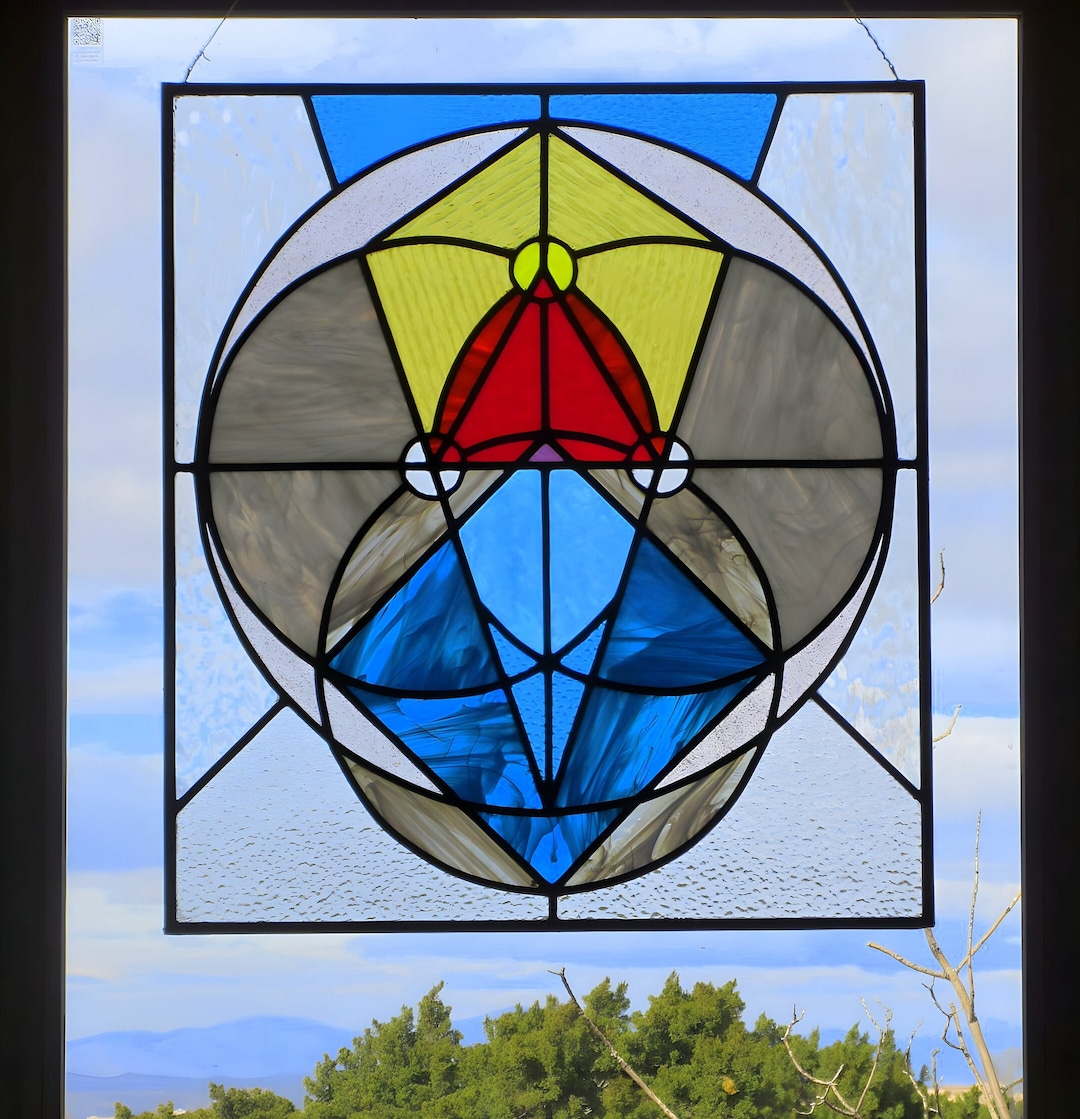 Stained Glass Panel Displaying a Circle, Square, Triangles, and ...